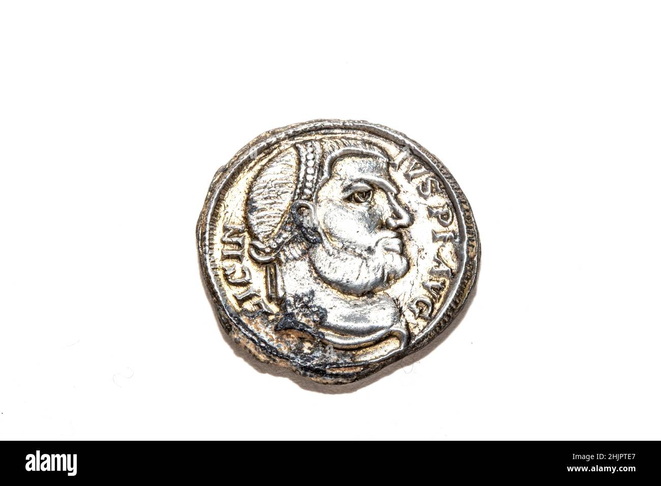 A Silver Old Roman Coin On White Background Stock Photo - Alamy