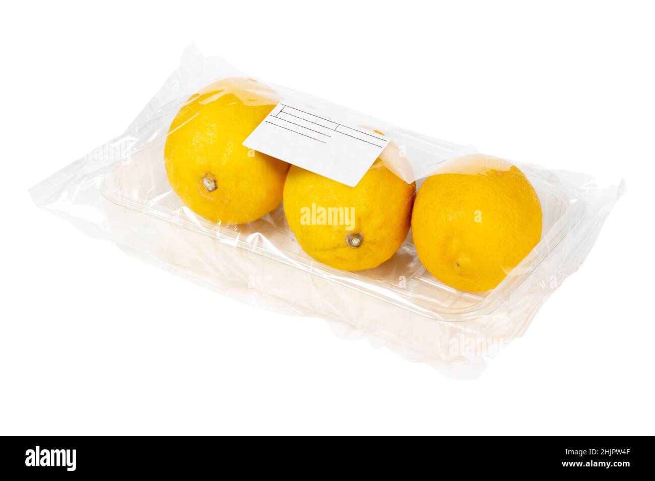 Packaged and labeled fresh lemons on an isolated white background Stock Photo - Alamy