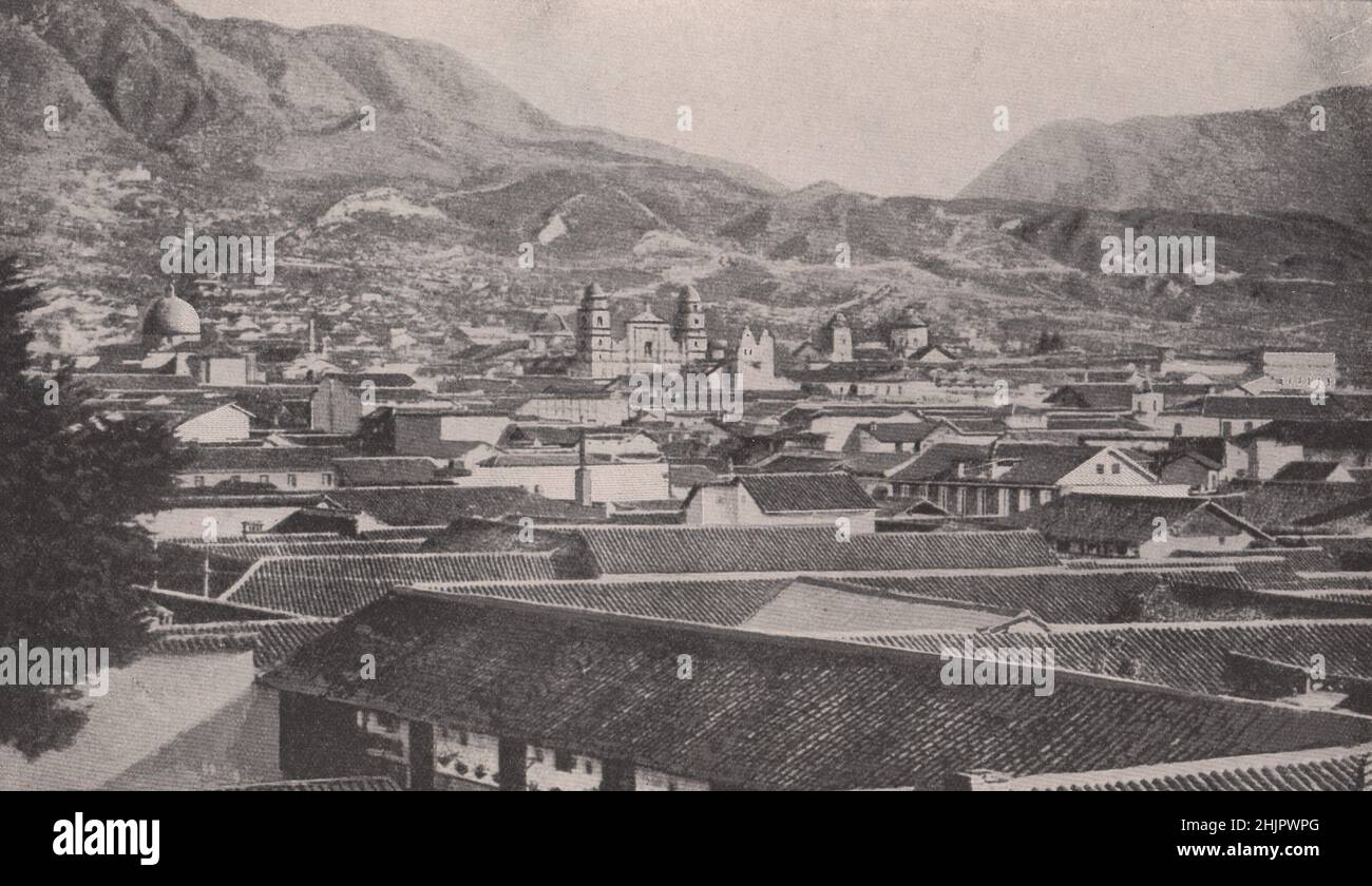 Towers of the Cathedral above the roofs of Bogota city on its hillgirt ...
