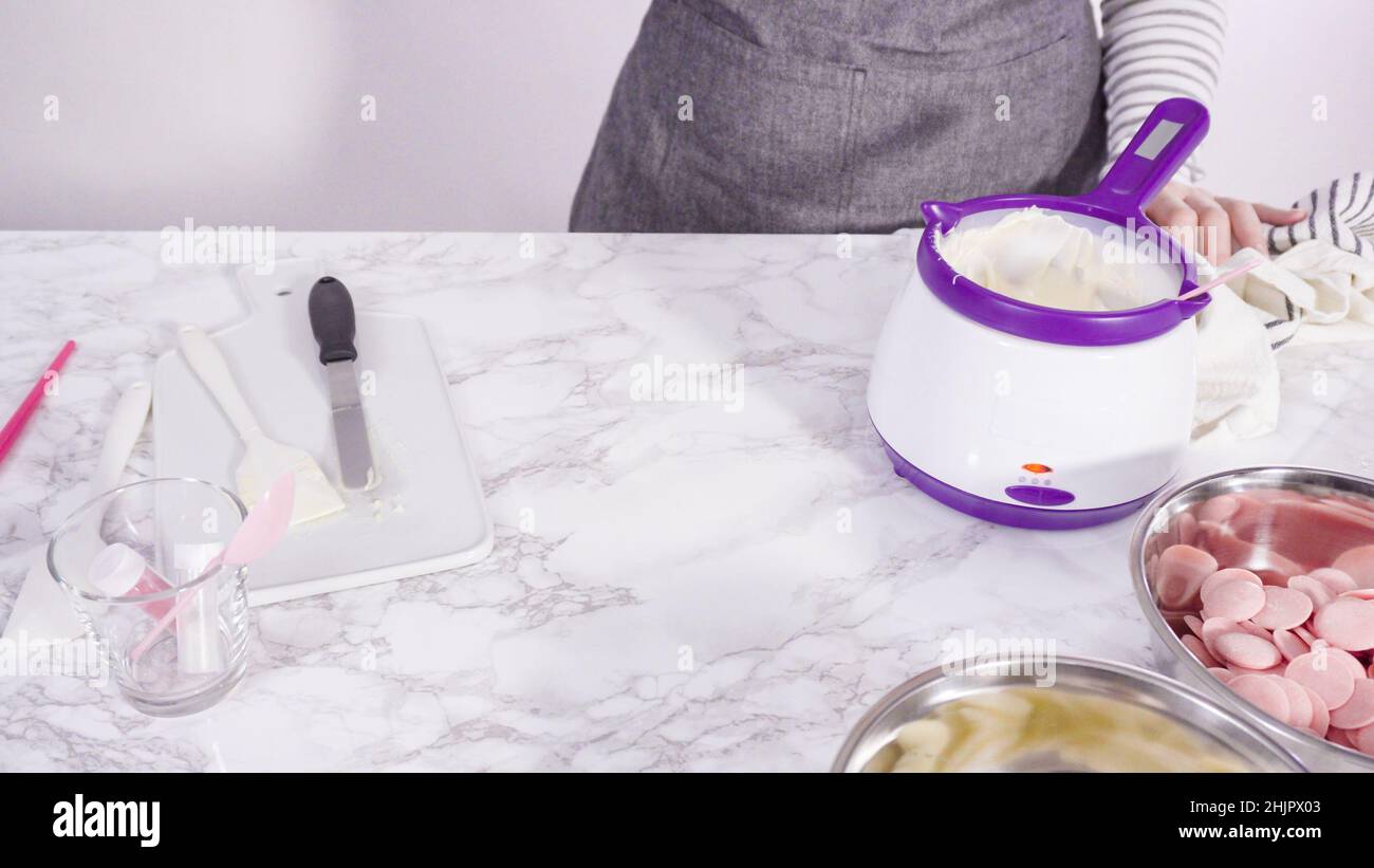 Step by step. Melting chocolate candy melts in an electric candy ...