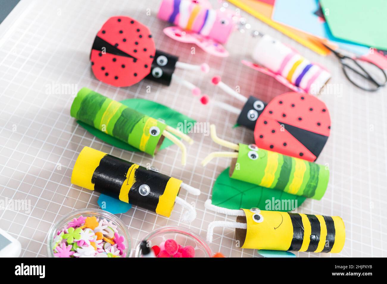 Making different bugs out of empty toilet paper rolls during ...