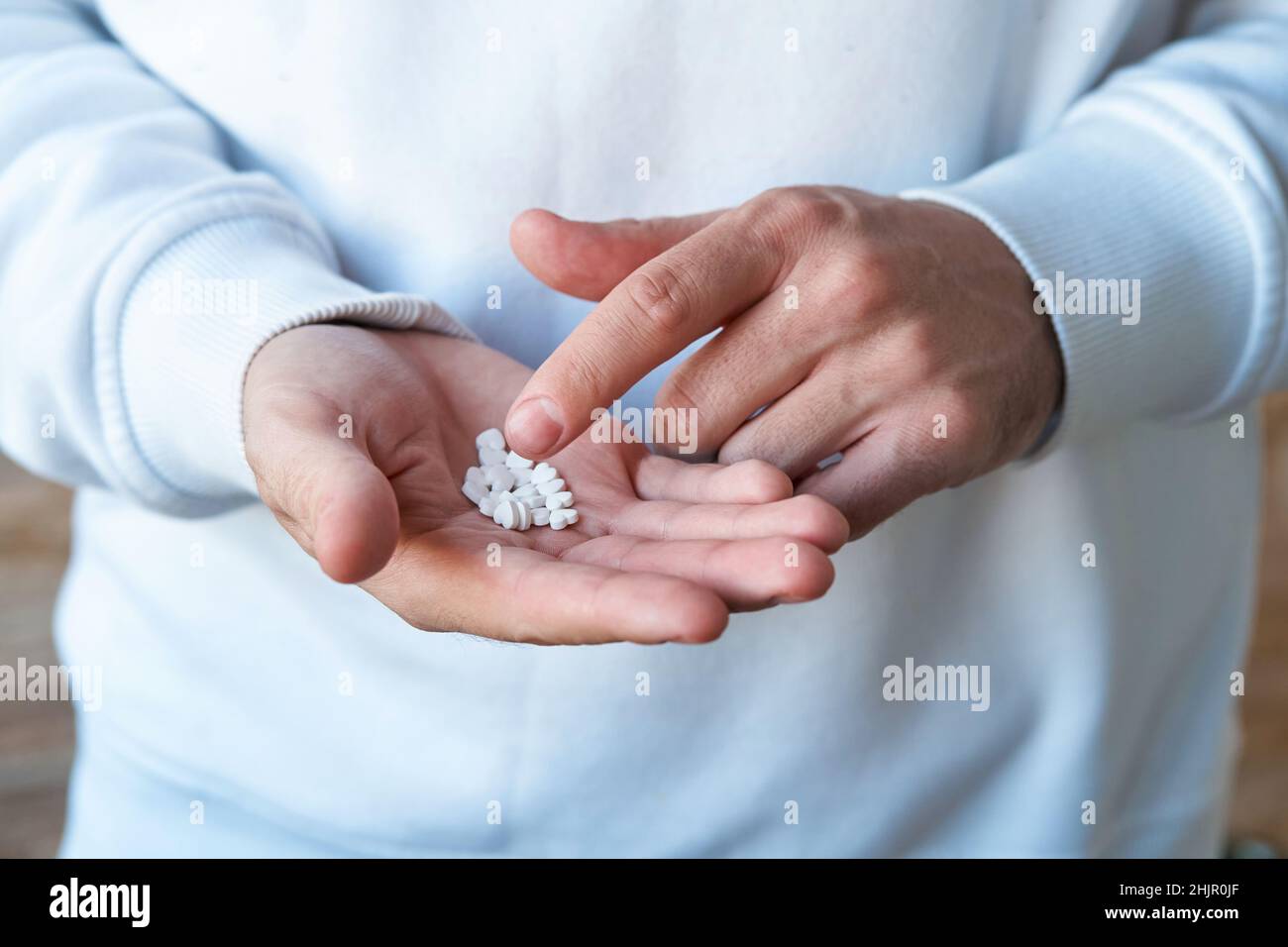 Heartache medicine. Pill in shape of heart against heart pain Stock ...