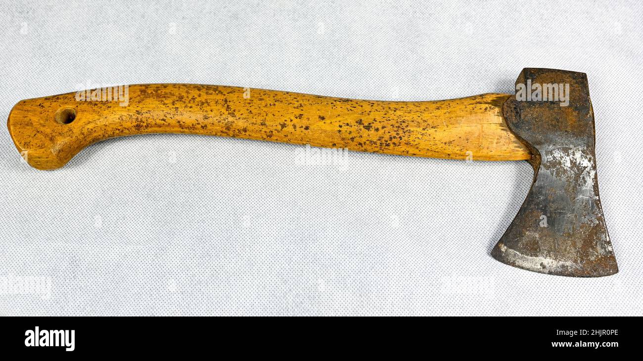 one little worn ax on white background Stock Photo - Alamy