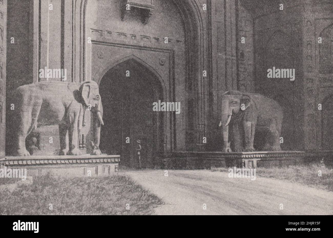 Twin Stone elephants at a gate of Delhi fort. India (1923 Stock Photo ...