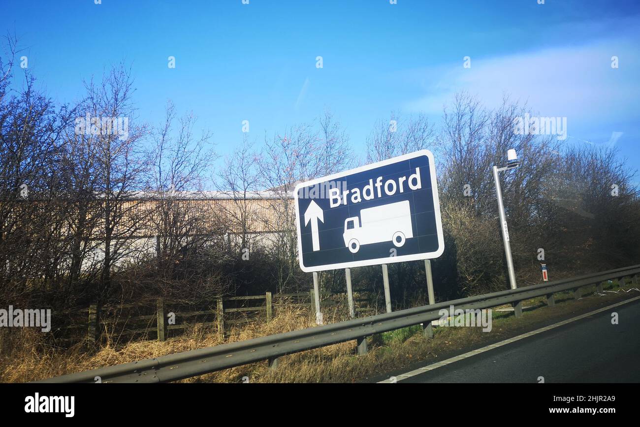 Bradford road sign on the M62 in West Yorkshire, England directing HGV ...