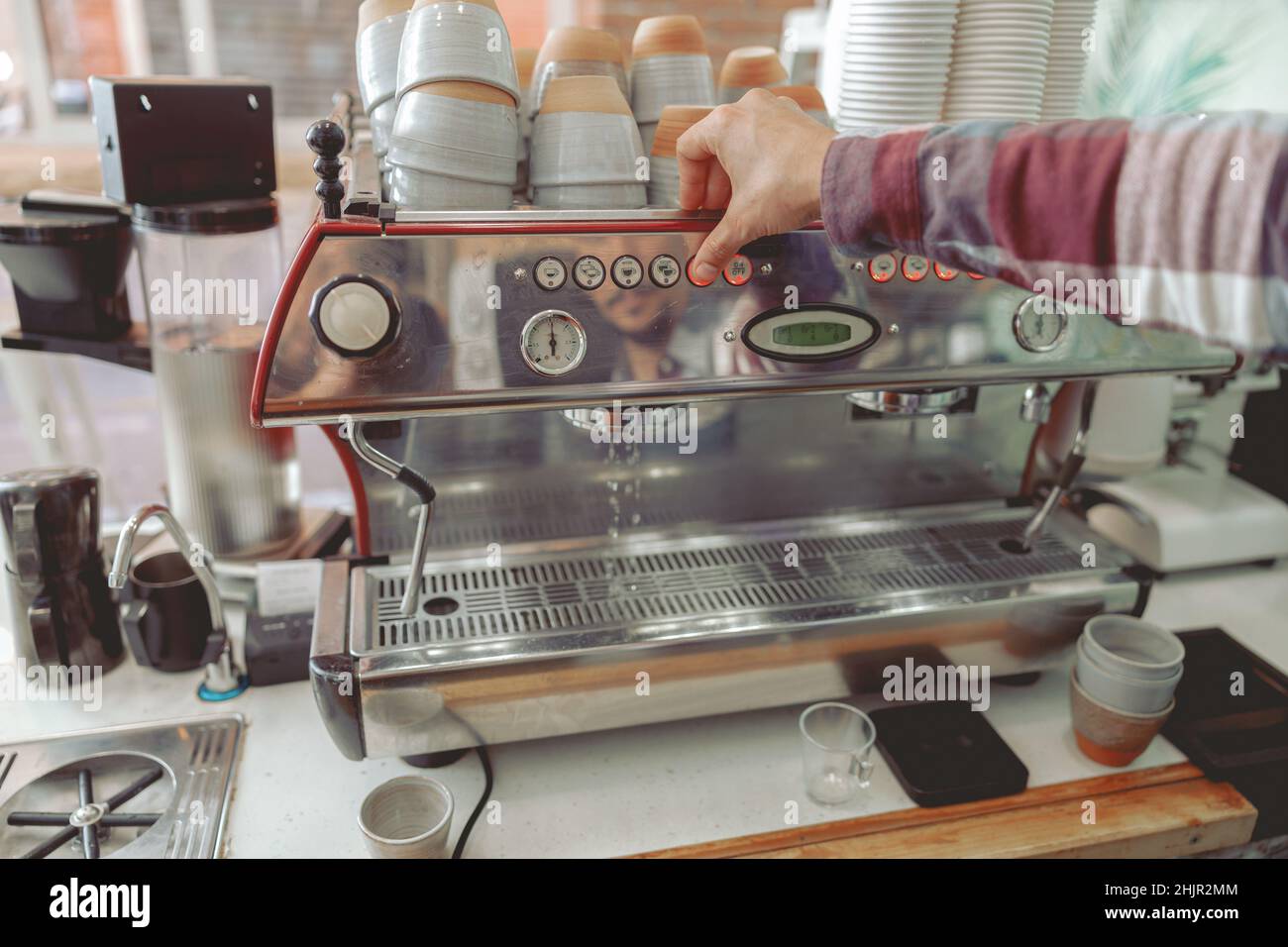 Process of cleaning coffee machine with two dispensing heads Stock ...