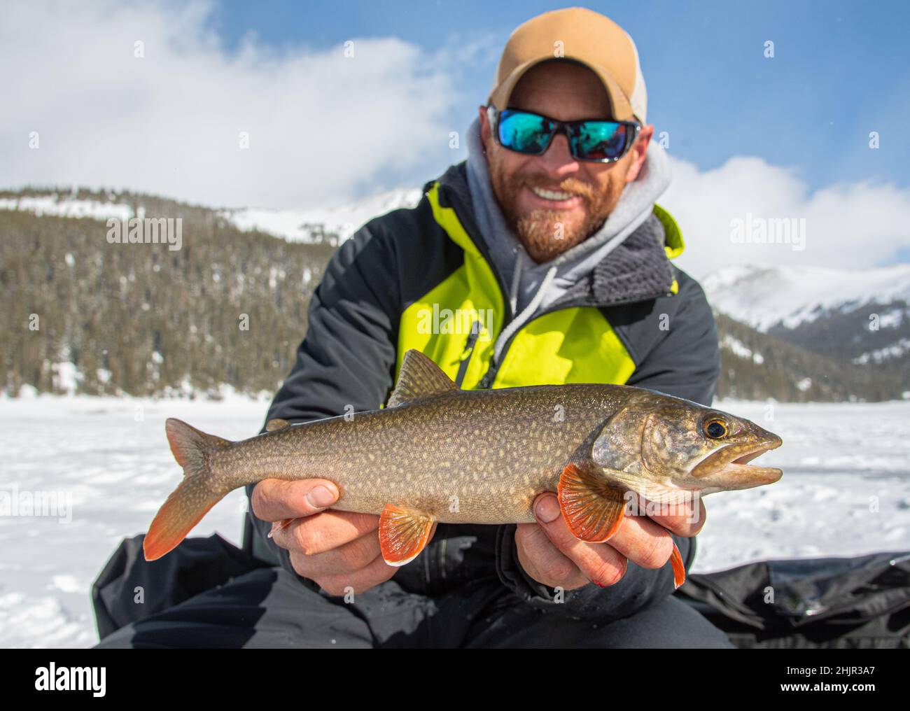 Man Grip and Grin with lake trout Stock Photo - Alamy