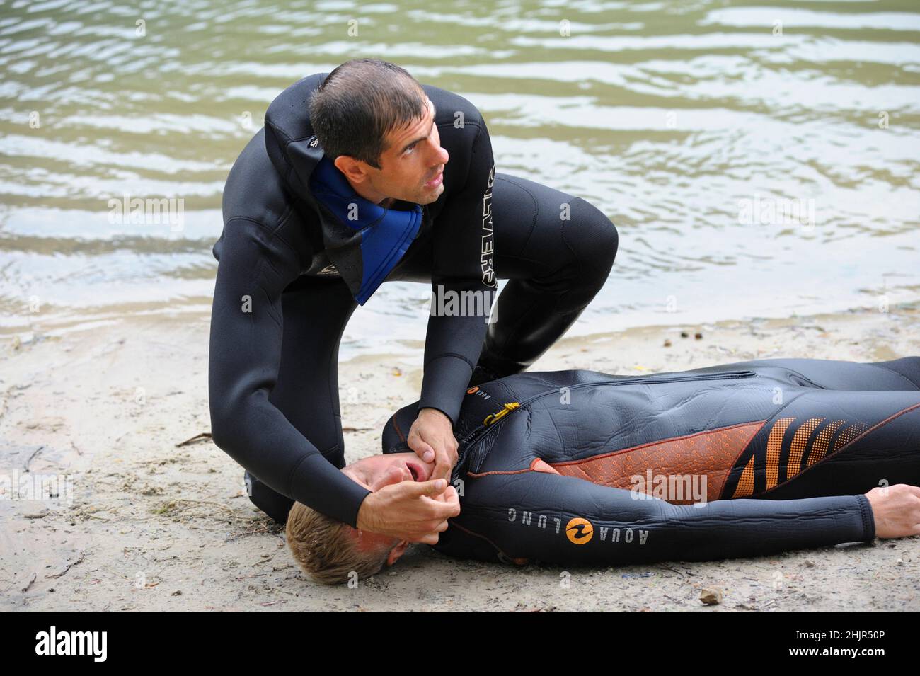 Lifeguards showing position of drowning body before doing mouth-to ...