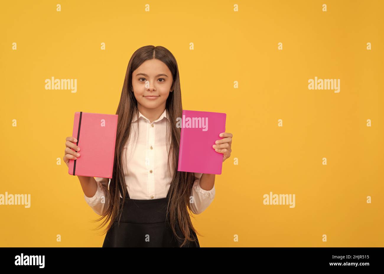 smiling teen girl hold books. nerd with planner notepad. back to school ...