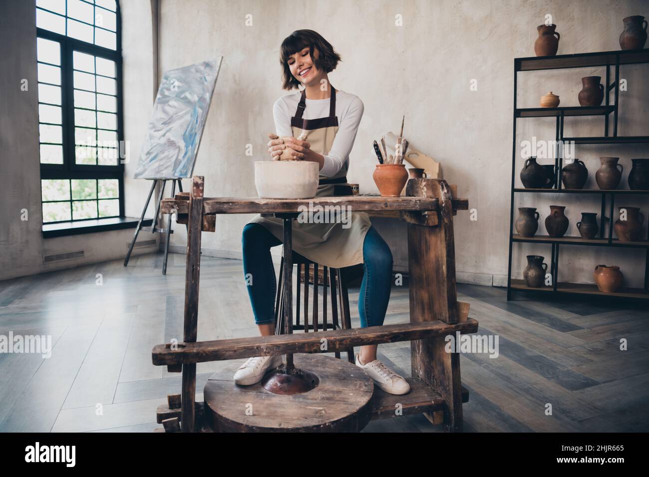 Full length photo of artistic lady pottery owner have pot forming ...