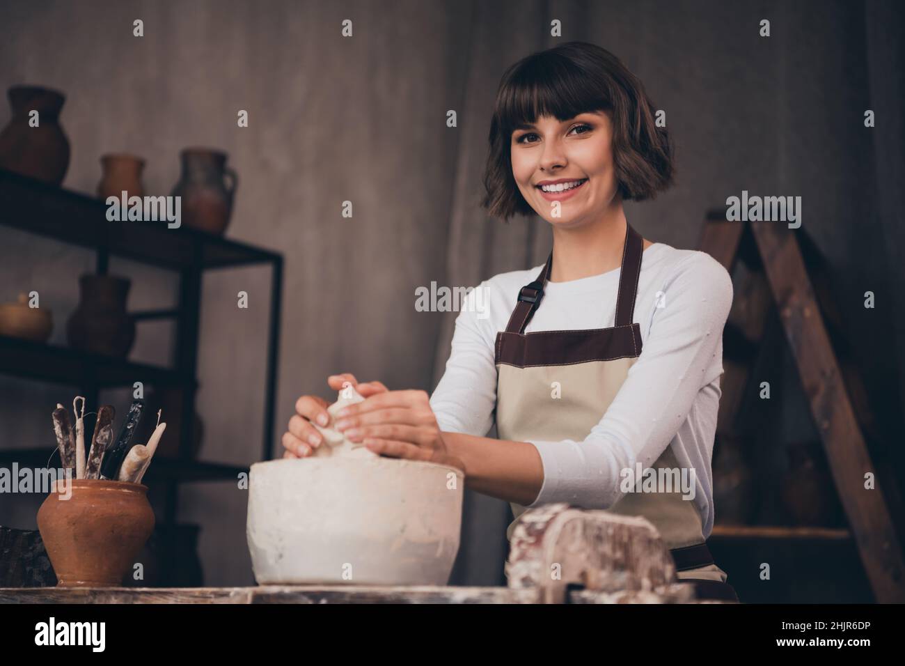 Photo of small store owner lady potter learning webinar pottery ...
