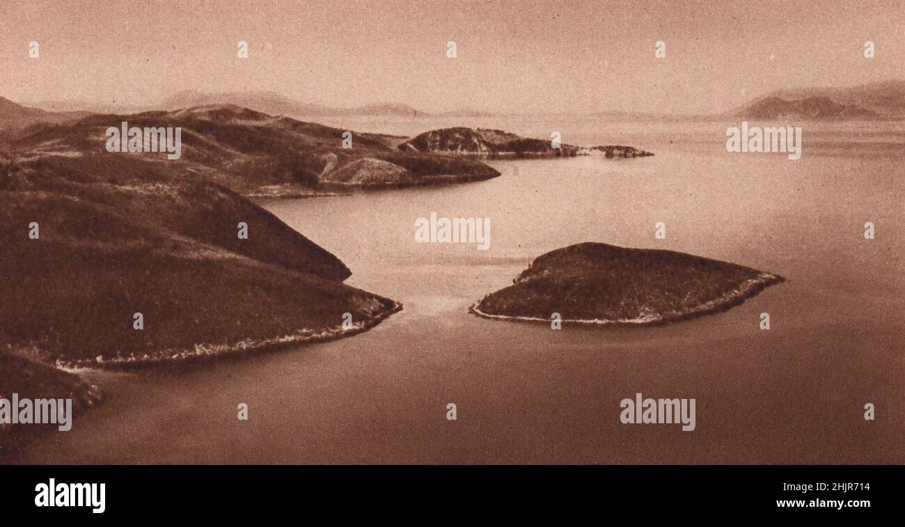 The Isle of Ithaca, where woods of olive trees fringe the shore. Greece ...