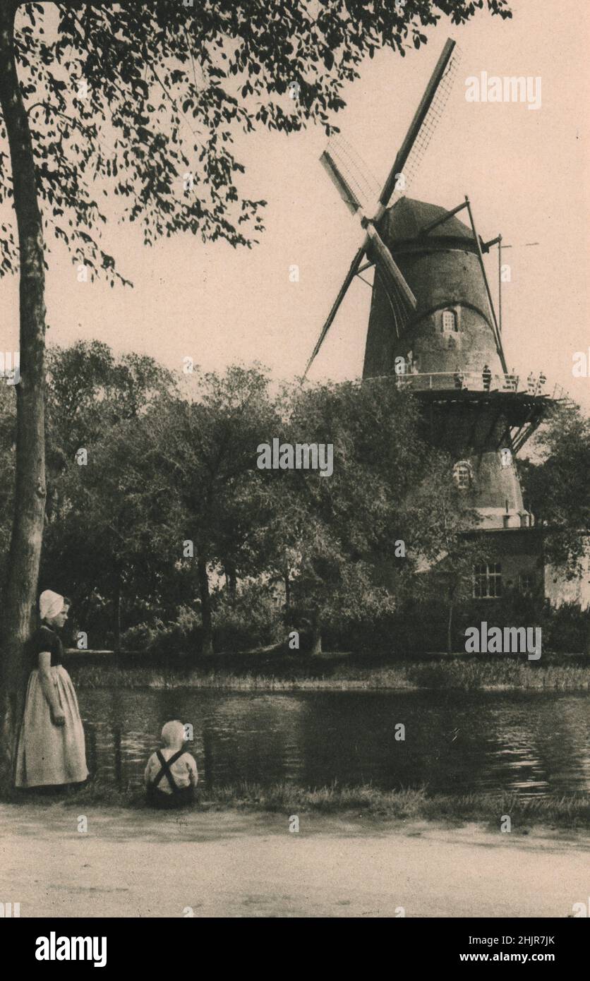 This giant windmill grinds the corn brought from the farms round ...
