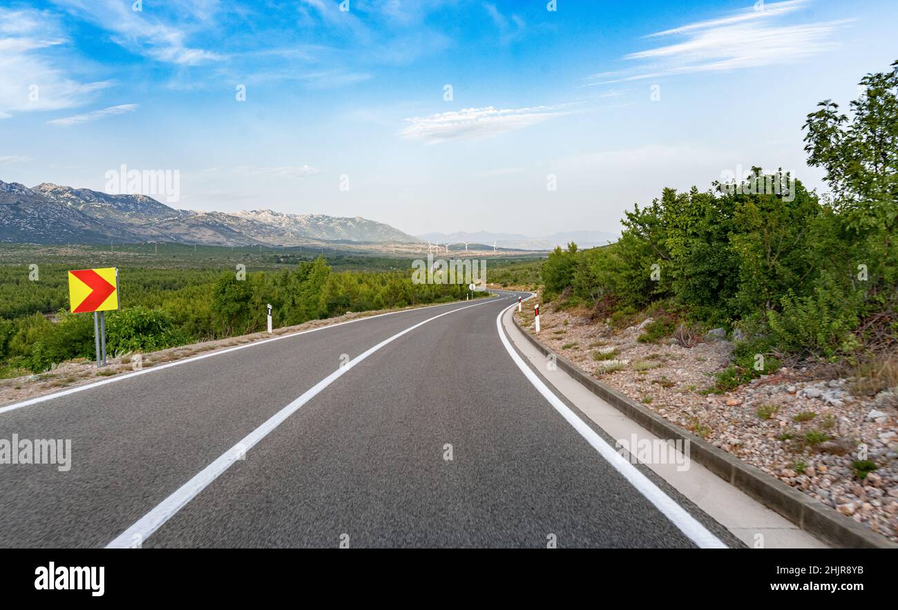 Scenic road. Road is surrounded by a magnificent natural landscape ...