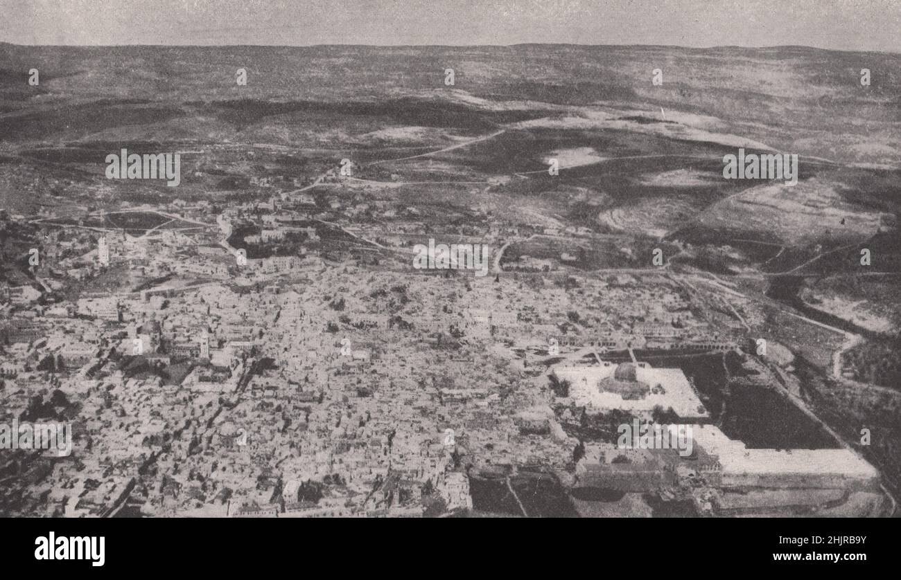 Aerial view of the holy city in its lofty setting among a cluster of ...
