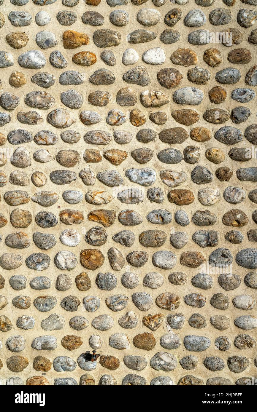 Traditional knapped flint stone wall in Norfolk, England Stock Photo ...