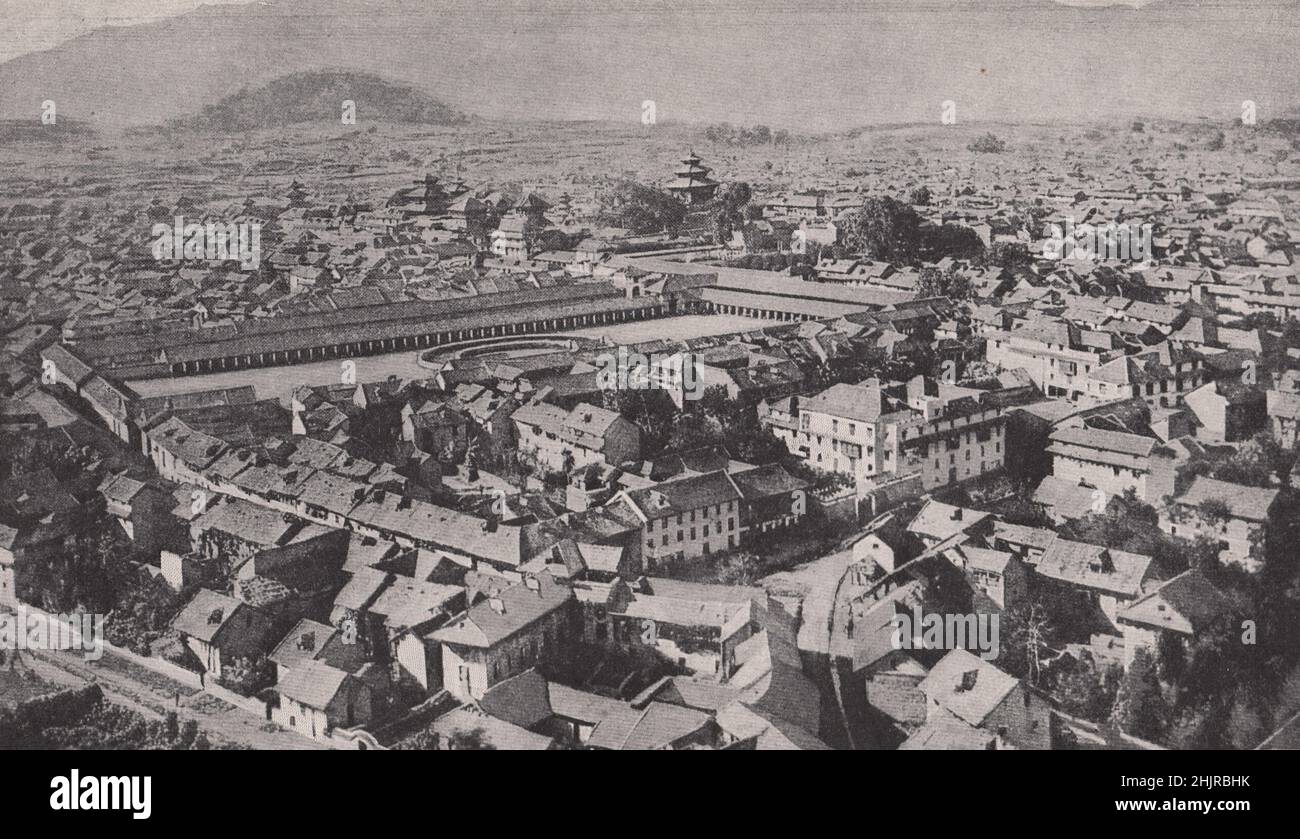 Buddhist temples and crowded houses in the straggling city of Khatmandu ...