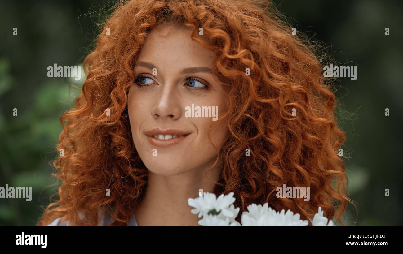 Pretty Girl With Curly Red Hair And Blue Eyes