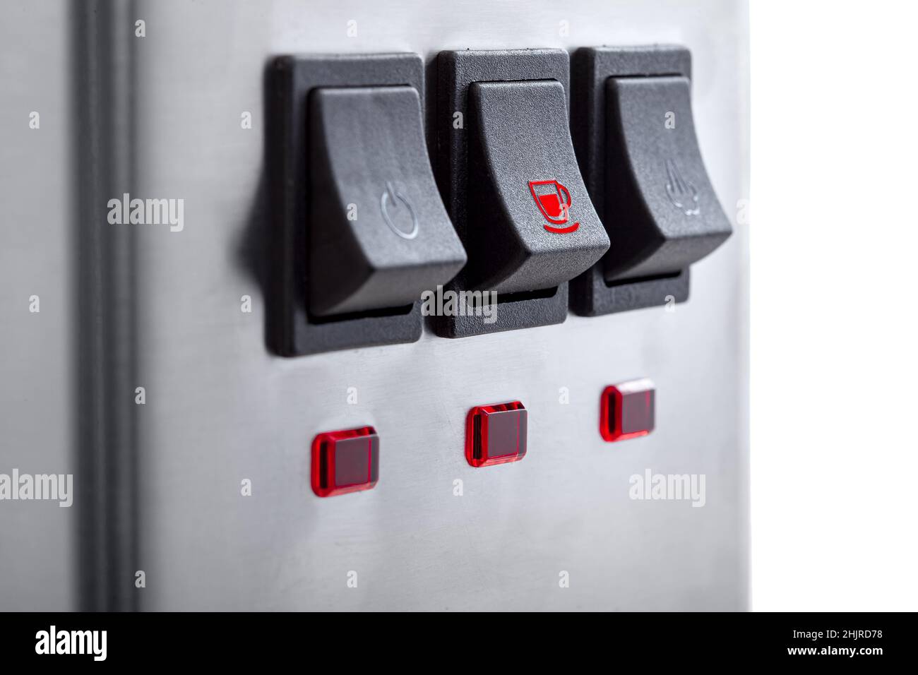 Black button for making coffee with a red icon cup, close-up of the ...