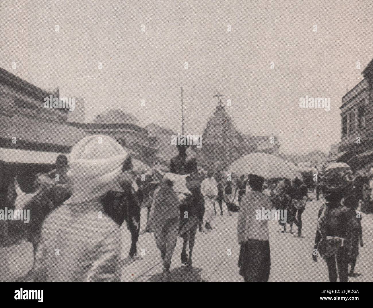Thronged Street of the densely populated native quarter. India. Madras ...
