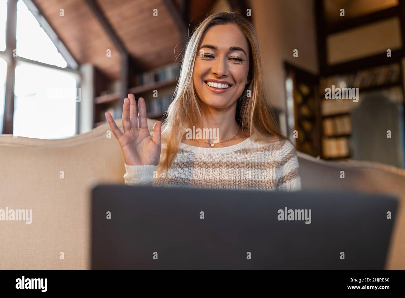Professional woman smiling waving hi-res stock photography and images ...