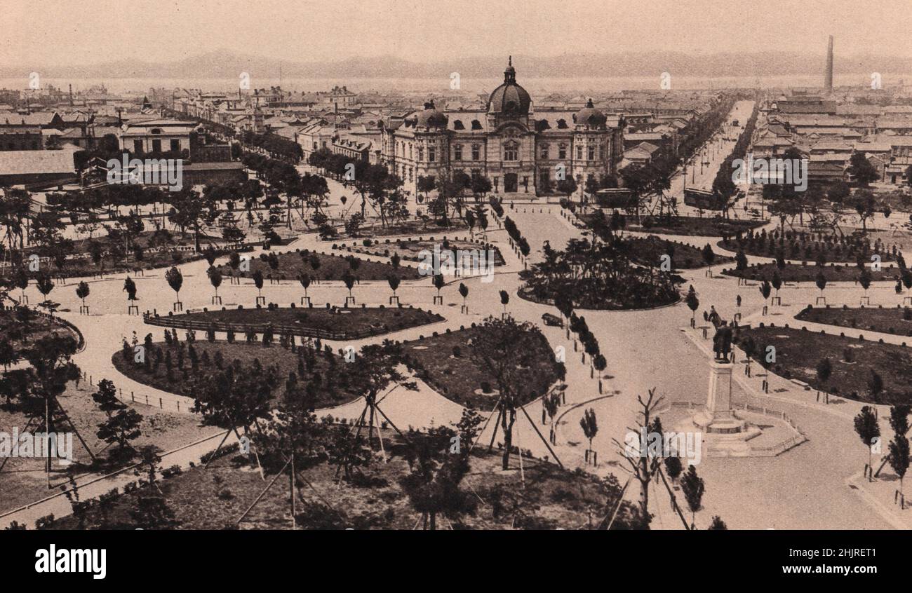 The hub of Dairen, the circular "Great Square" planted with trees ...