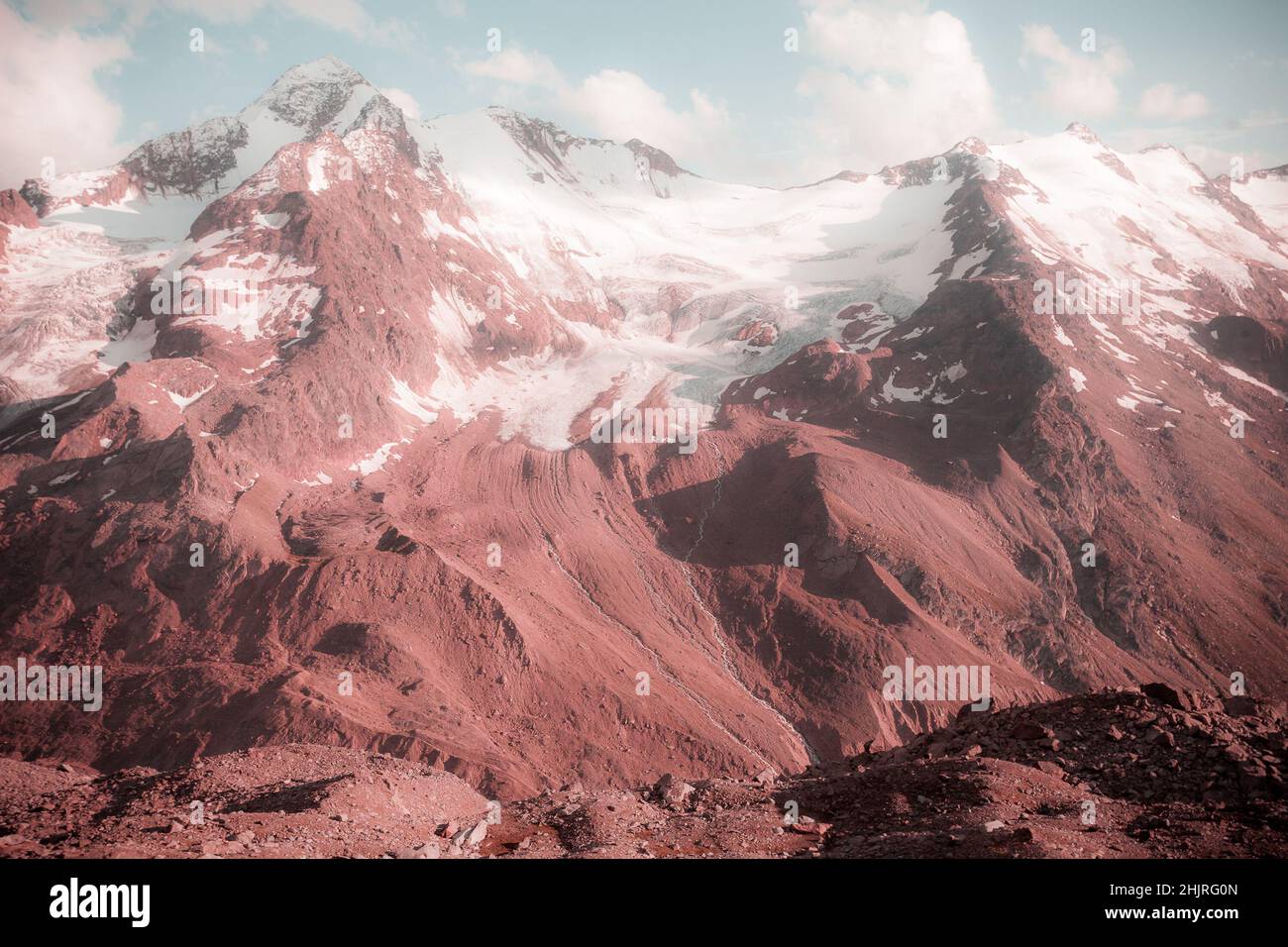 Fantasy pink color image of glaciers at the foot of the Palla Bianca ...