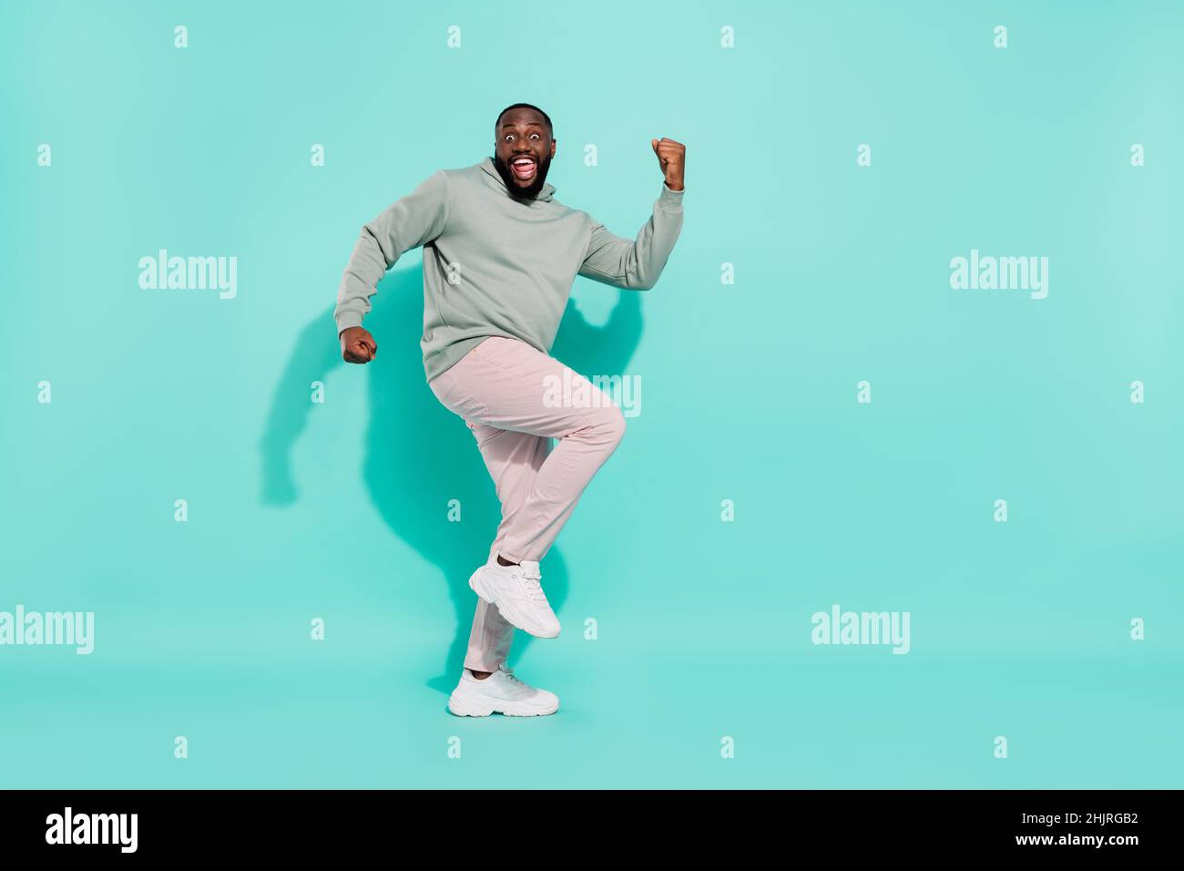Full length body size view of cheery lucky attractive guy dancing ...