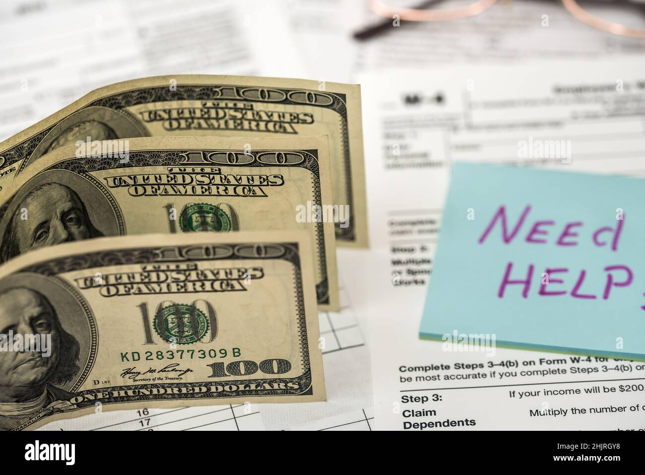 Need help text on sticker with 1040 tax form Stock Photo - Alamy