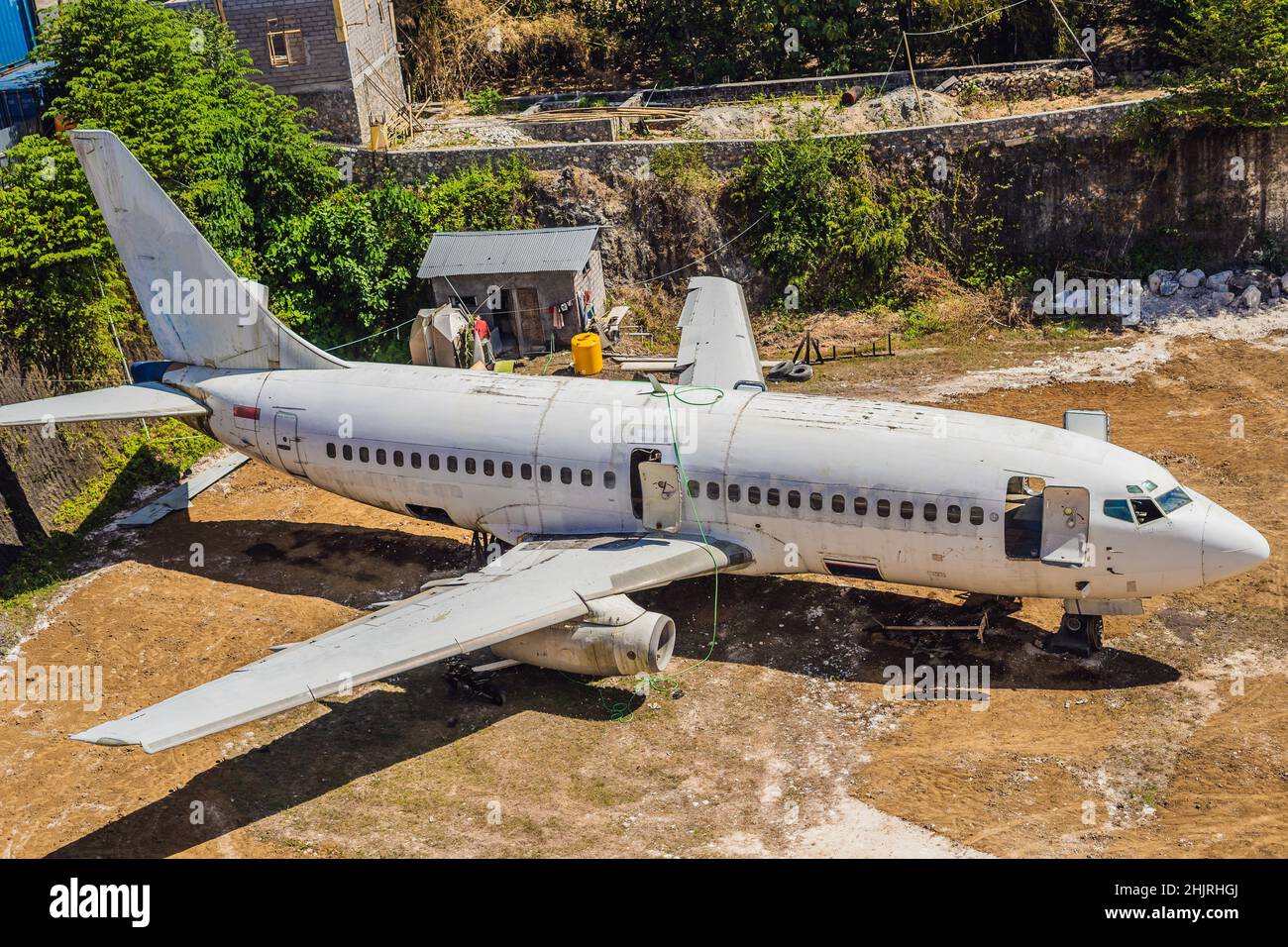 An old passenger aircraft on aviation waste Stock Photo - Alamy