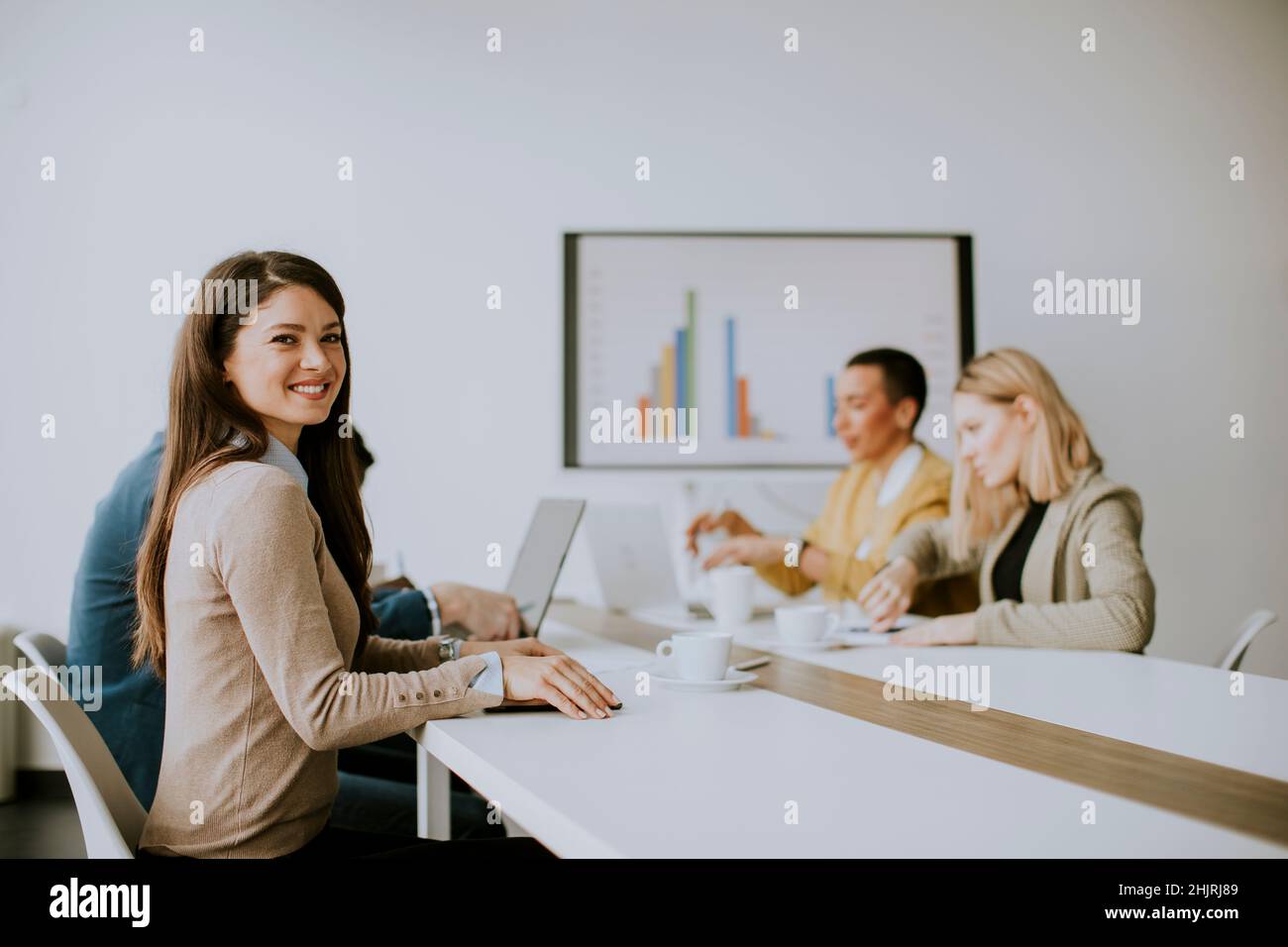 Group of young business people working together and preparing new ...