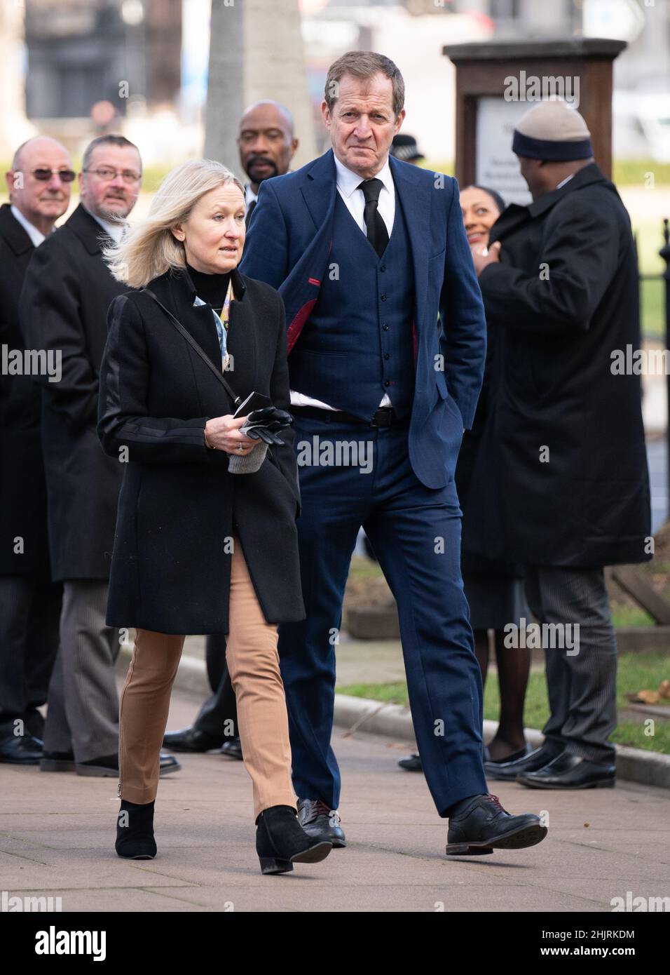 Alastair Campbell and partner Fiona Millar arriving for the funeral of ...