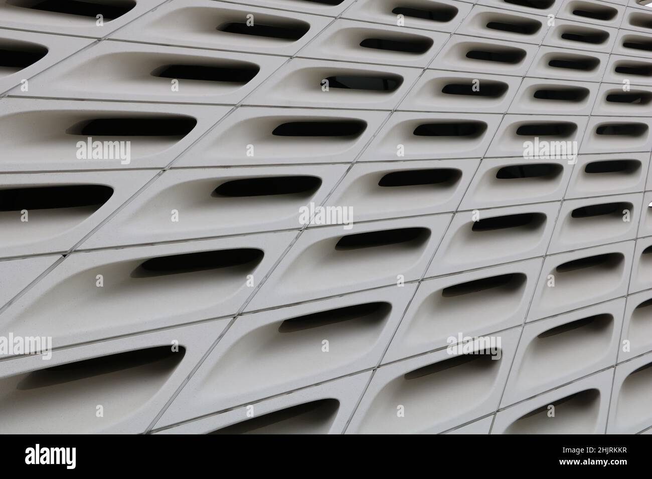 White modern style exterior wall resembling a net with stretched ...