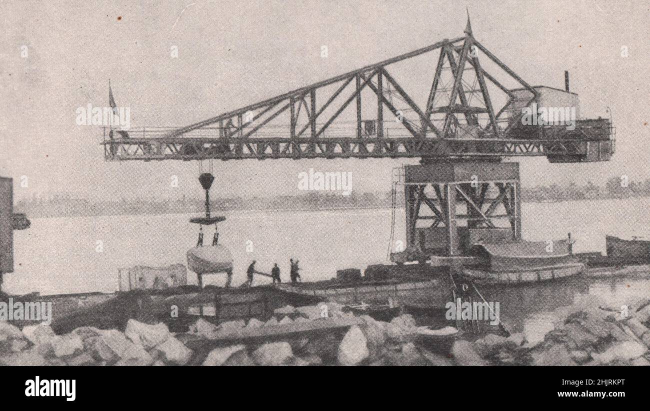 Crane at work on one of the wharves in Lagos Harbour. Nigeria (1923 ...