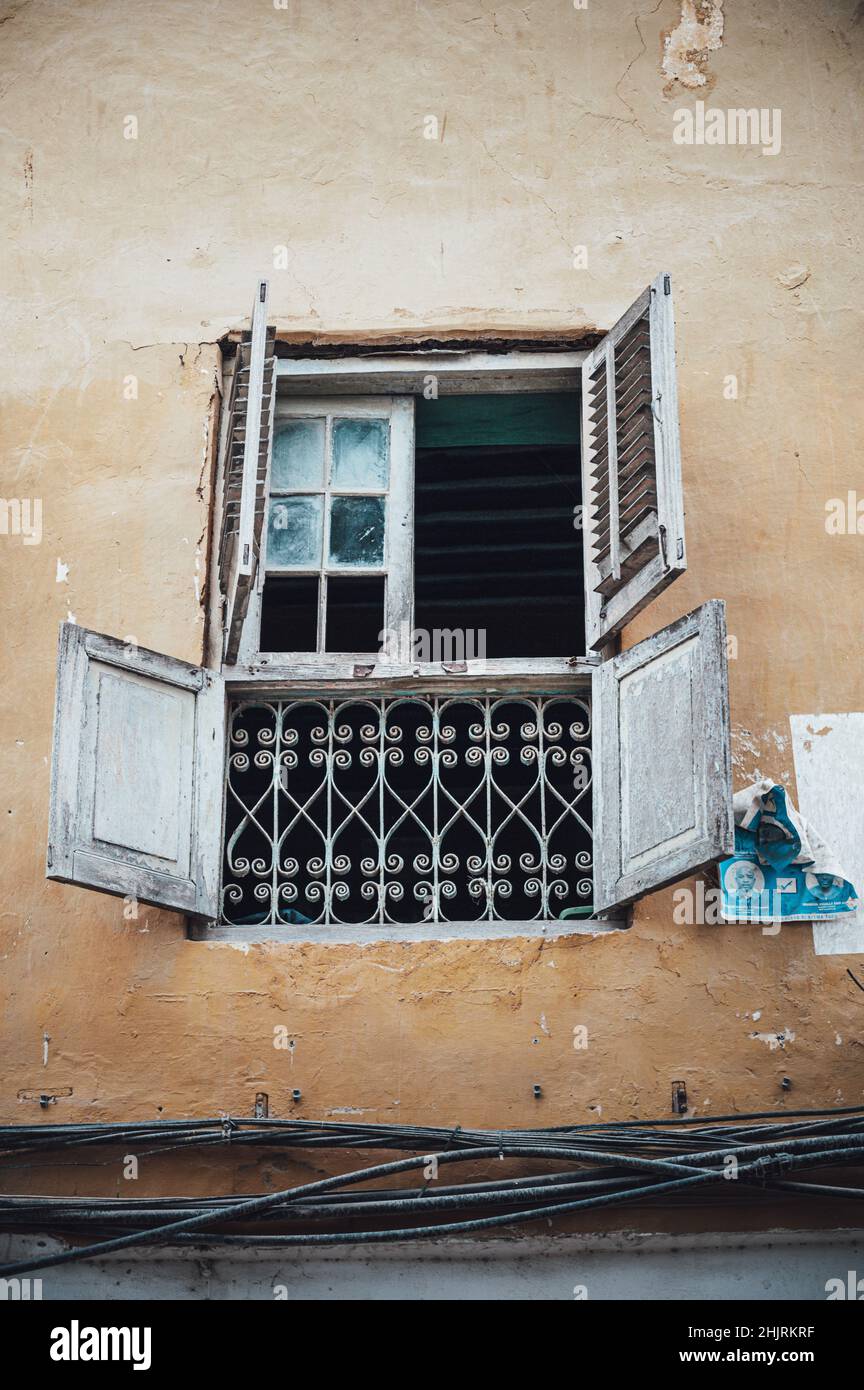 Vertical of an old-fashioned window on an antique building Stock Photo ...