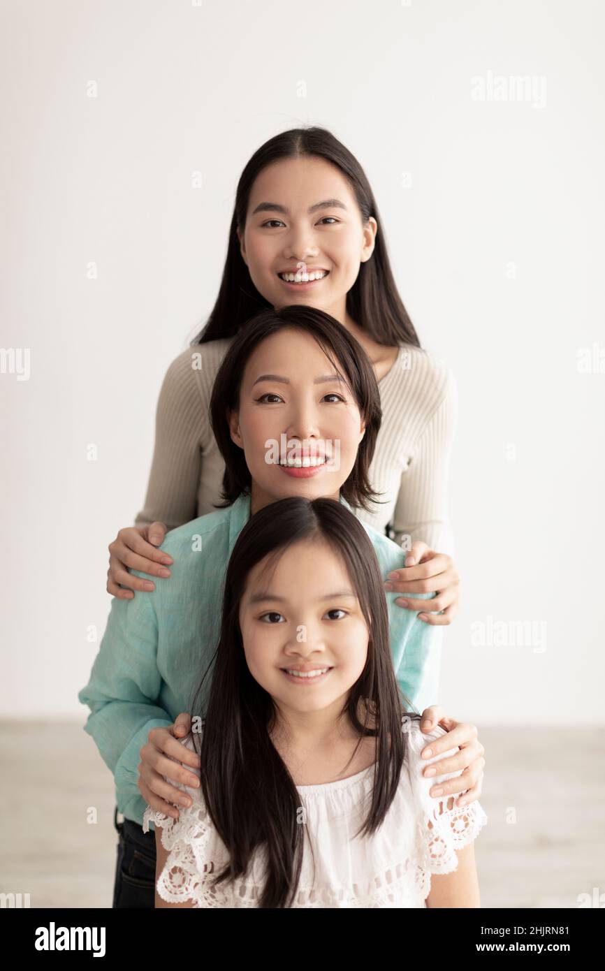 Portrait of happy Asian multi generation family with mother, daughter ...