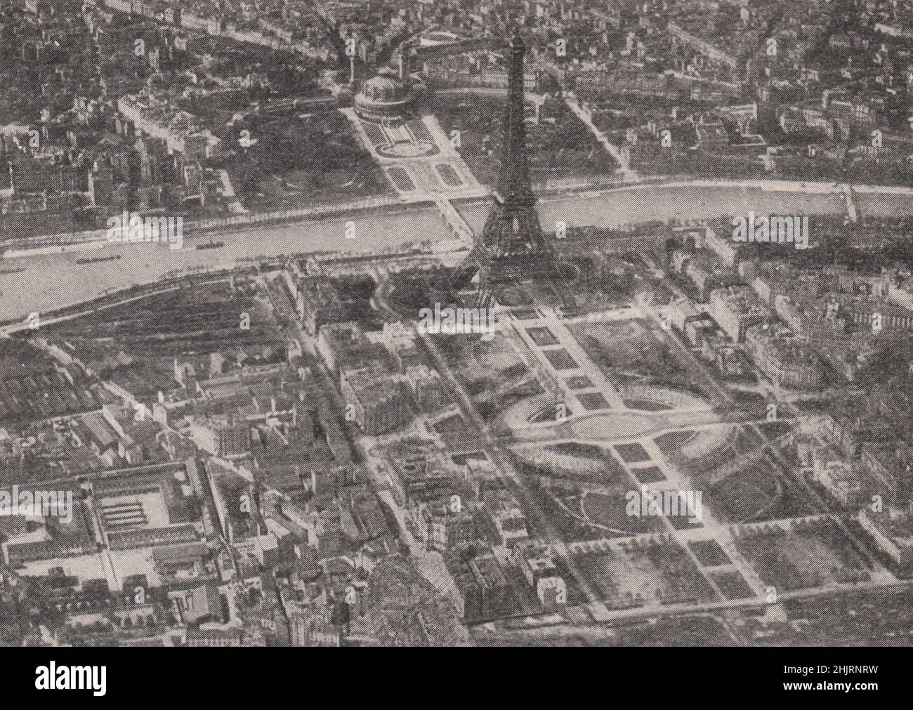Huge structure of the Eiffel tower upon the Champ de Mars. Paris (1923 ...