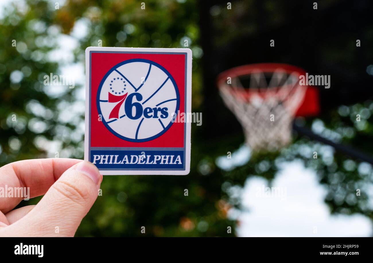 September 15, 2021, Philadelphia, USA, A man holds the emblem of the ...