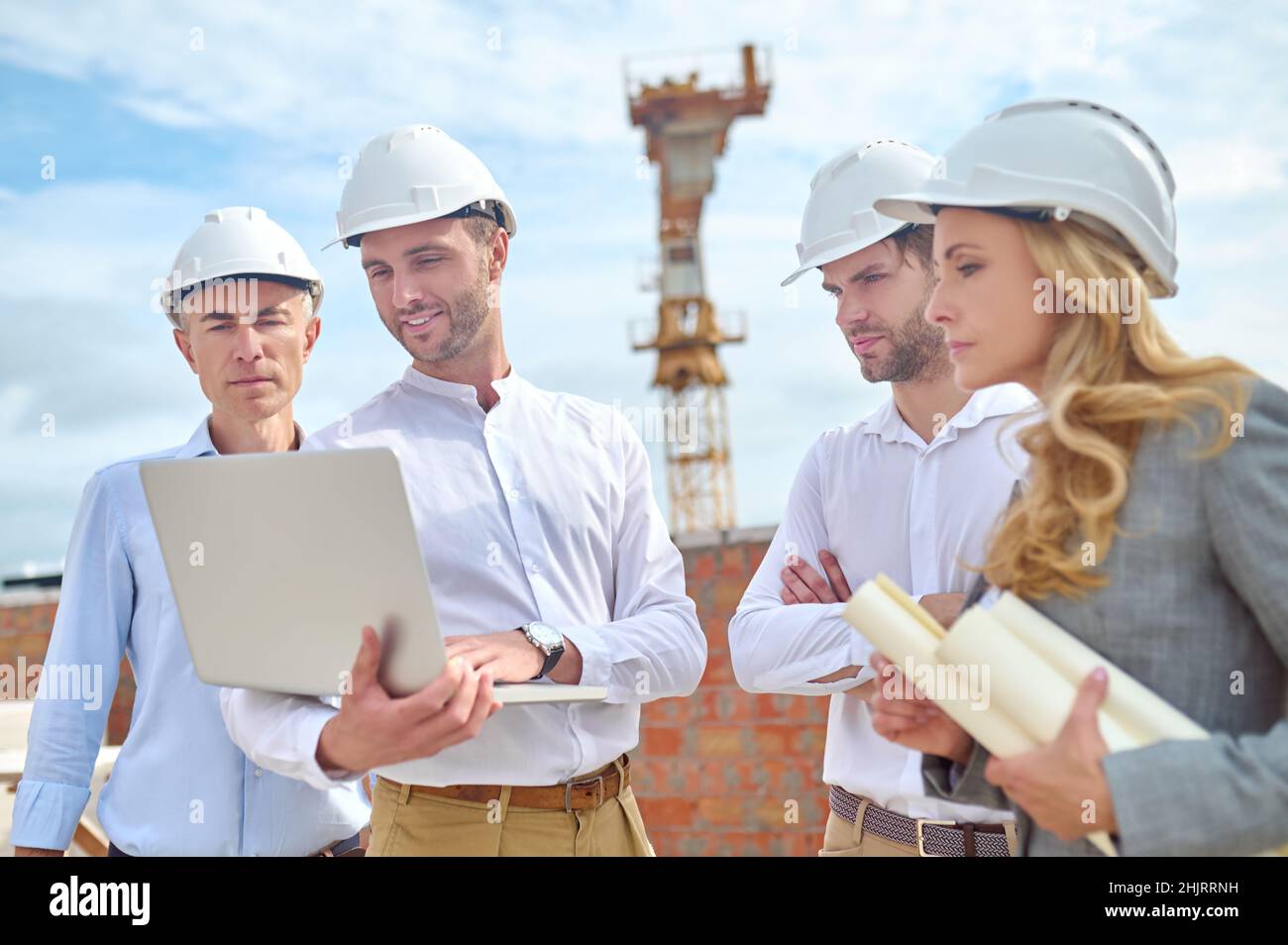 Foreman laptop new construction site hi-res stock photography and ...