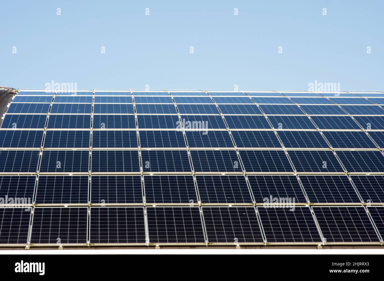 Large curved roof with solar panels for electric power generation Stock ...