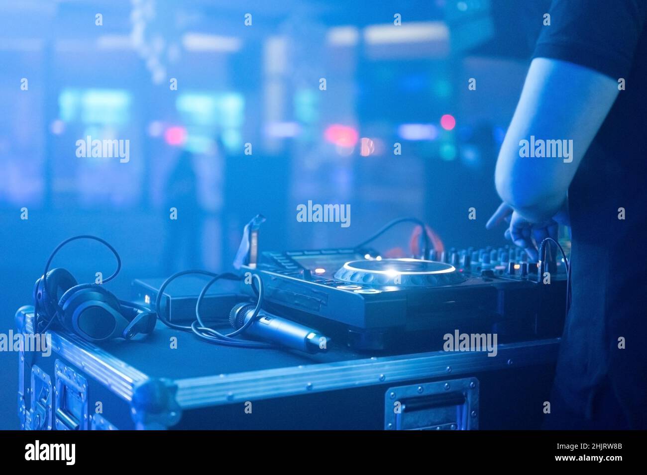 Dj mixing at party festival with light and smoke in background - Summer ...