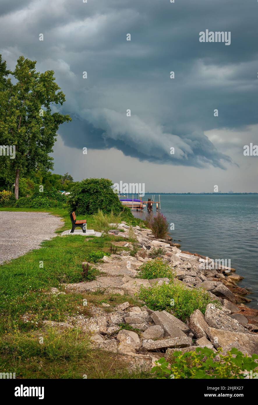 Storm clouds forming on a summer day Along Detroit River Stock Photo ...