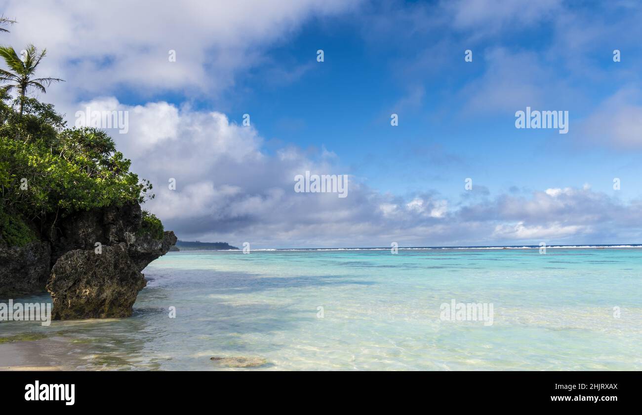 Crystal clear Pacific Ocean from Mare Beach in New Caledonia Stock ...