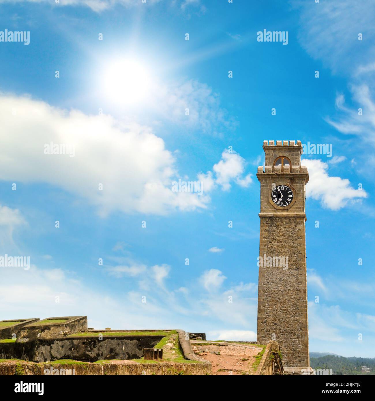 Clock on the tower. Asian fort Halle. Sri Lanka. Bright sunny sky Stock ...