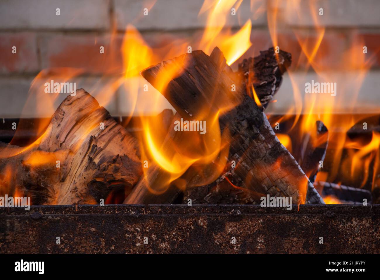 beautiful bright fire in the backyard for barbecue Stock Photo - Alamy