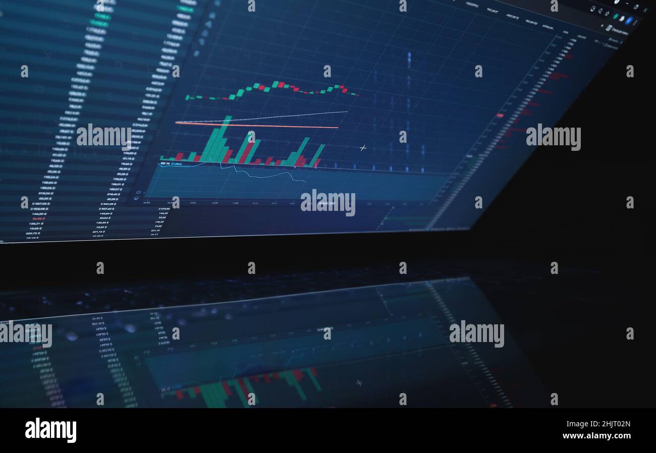 Laptop screen with stock market charts. Technical analysis and ...