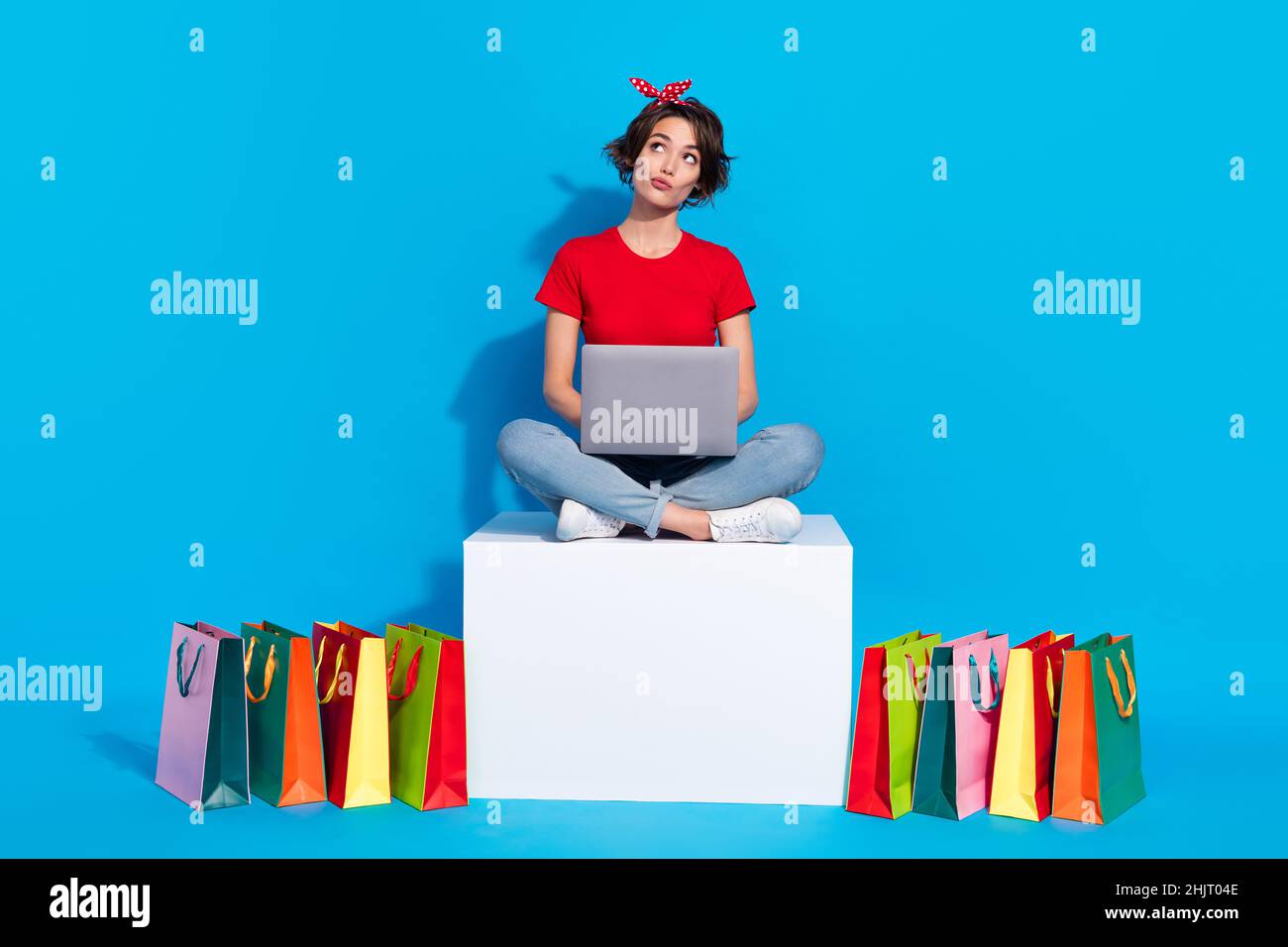 Full body photo of young girl curious look empty space unsure plan ...