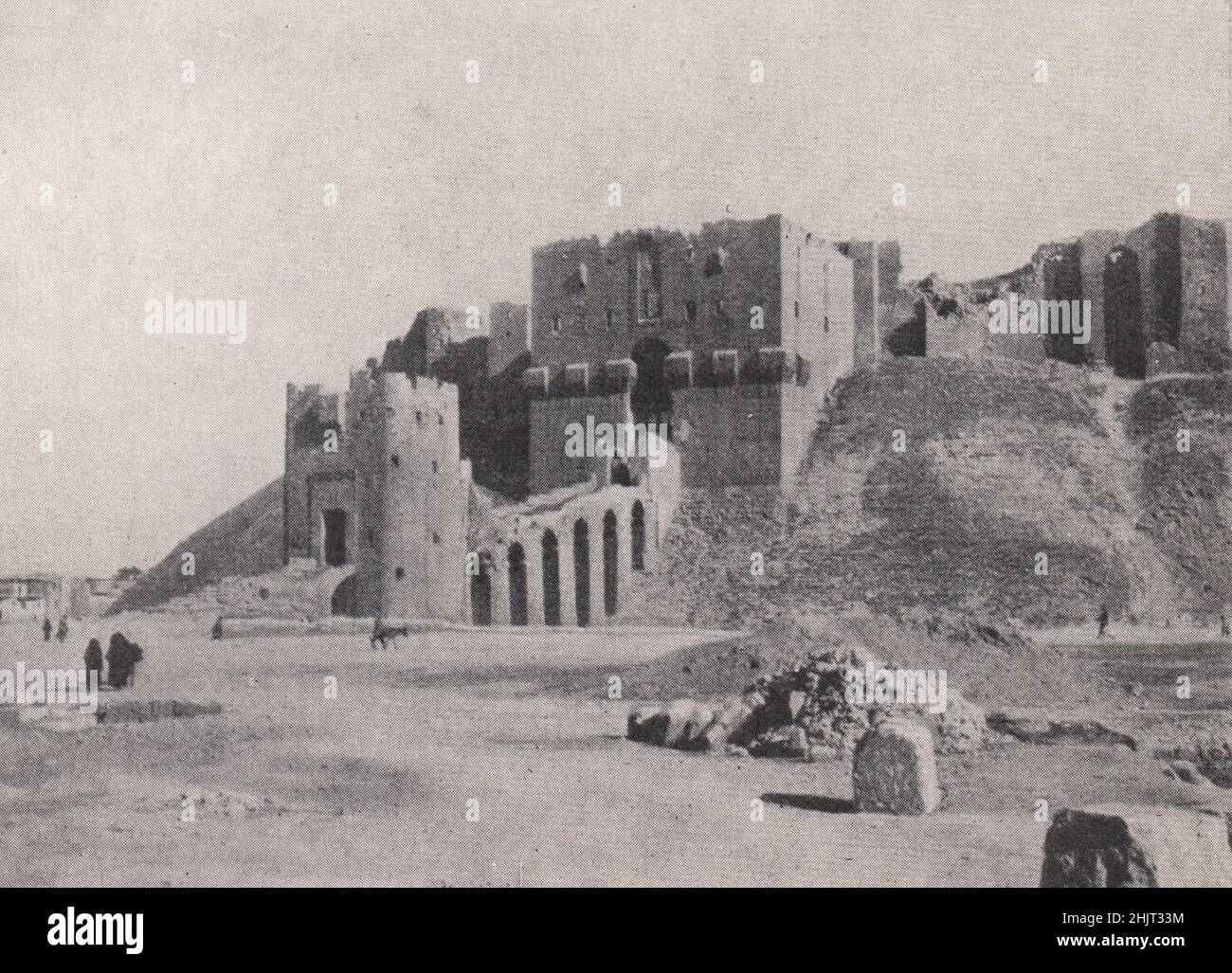 Crumbling walls of Aleppo's old Citadel. Syria. Levant (1923 Stock ...