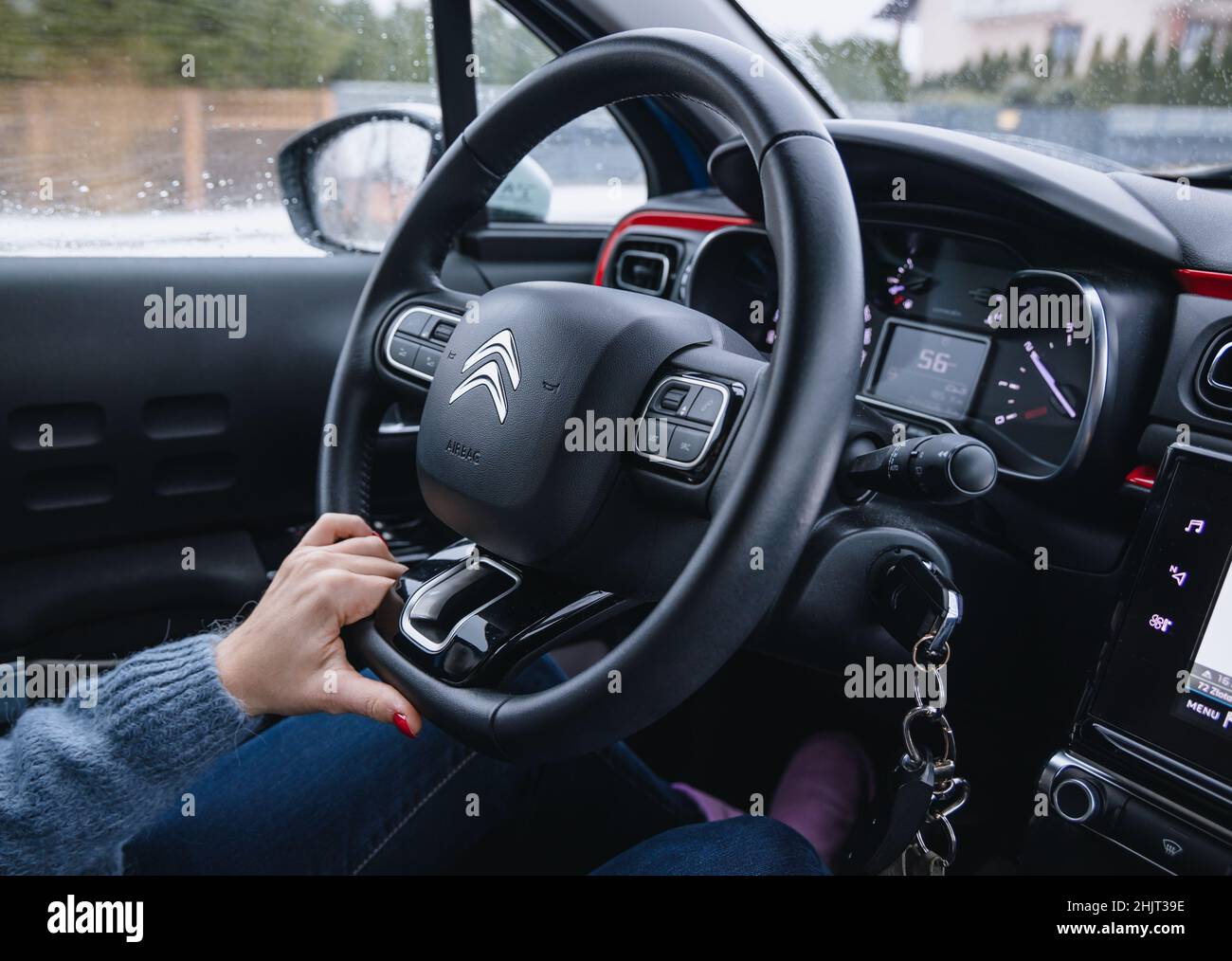 Woman driving Citroen C3 car Stock Photo - Alamy