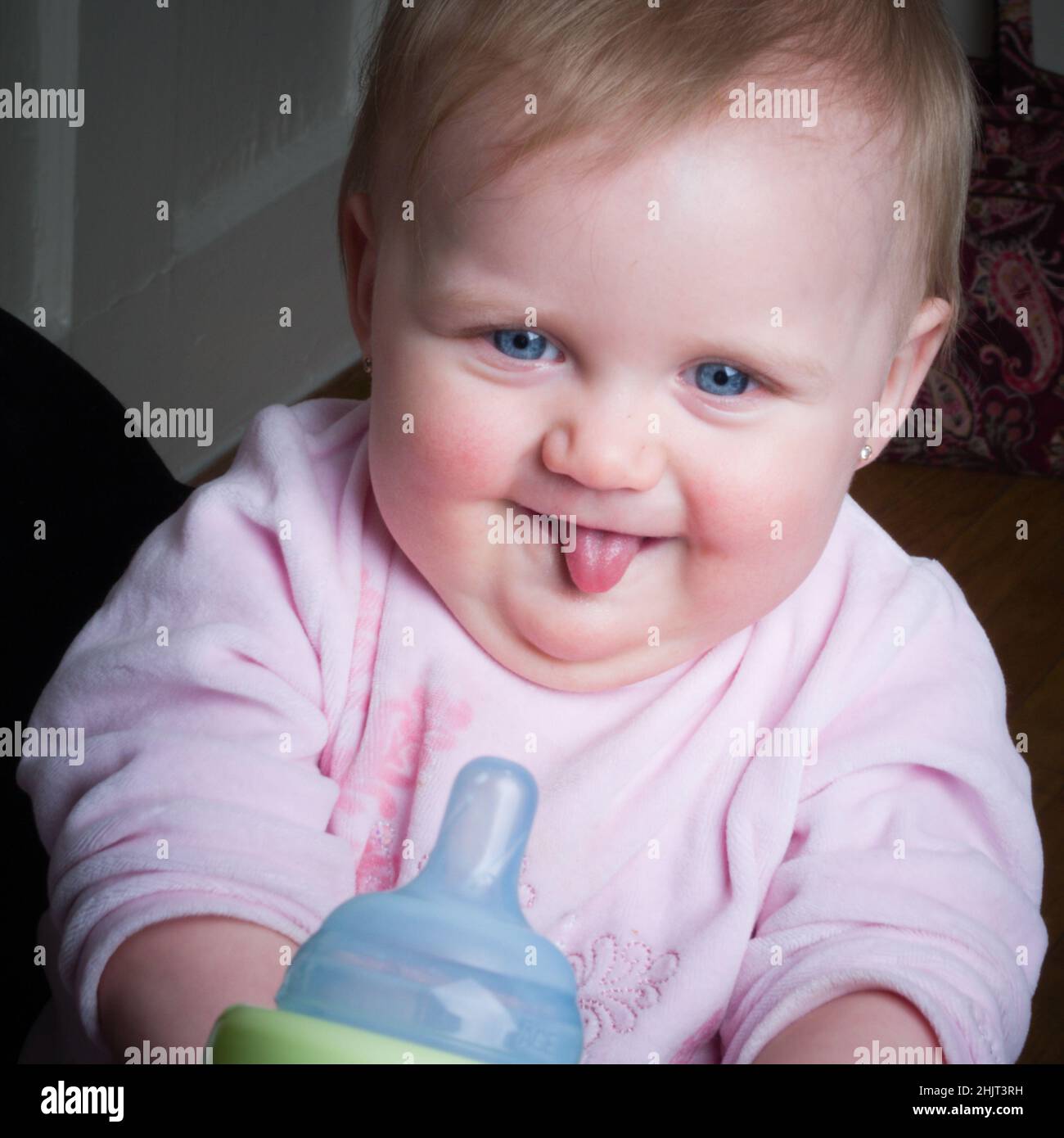 Baby Face with bottle Stock Photo - Alamy